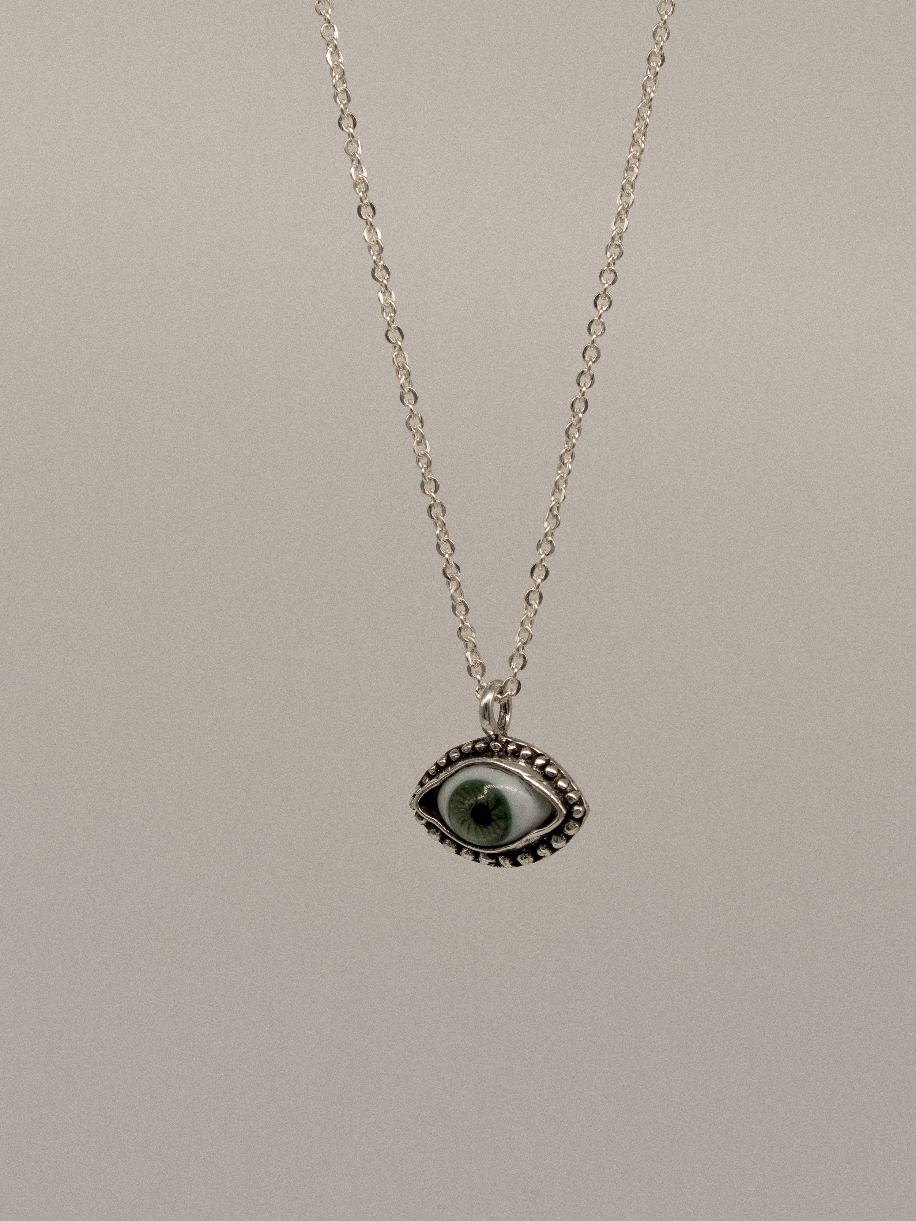 Green eye necklace store